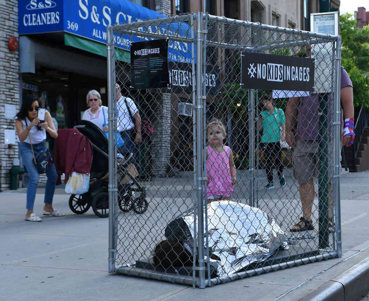 Chilling artistic replicas of caged children pop up across the city ...