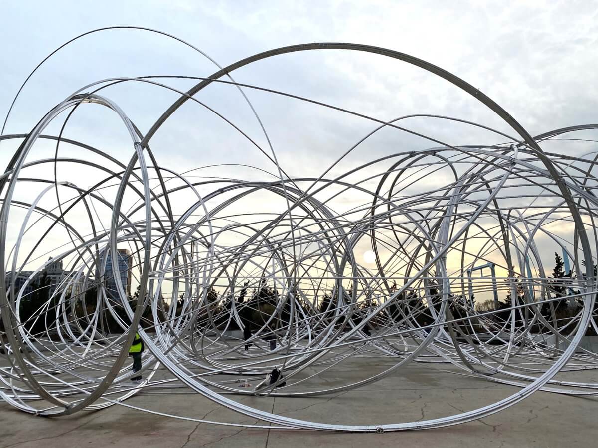 In the loop: Massive sculpture takes Park’s Pier 3 to new heights ...