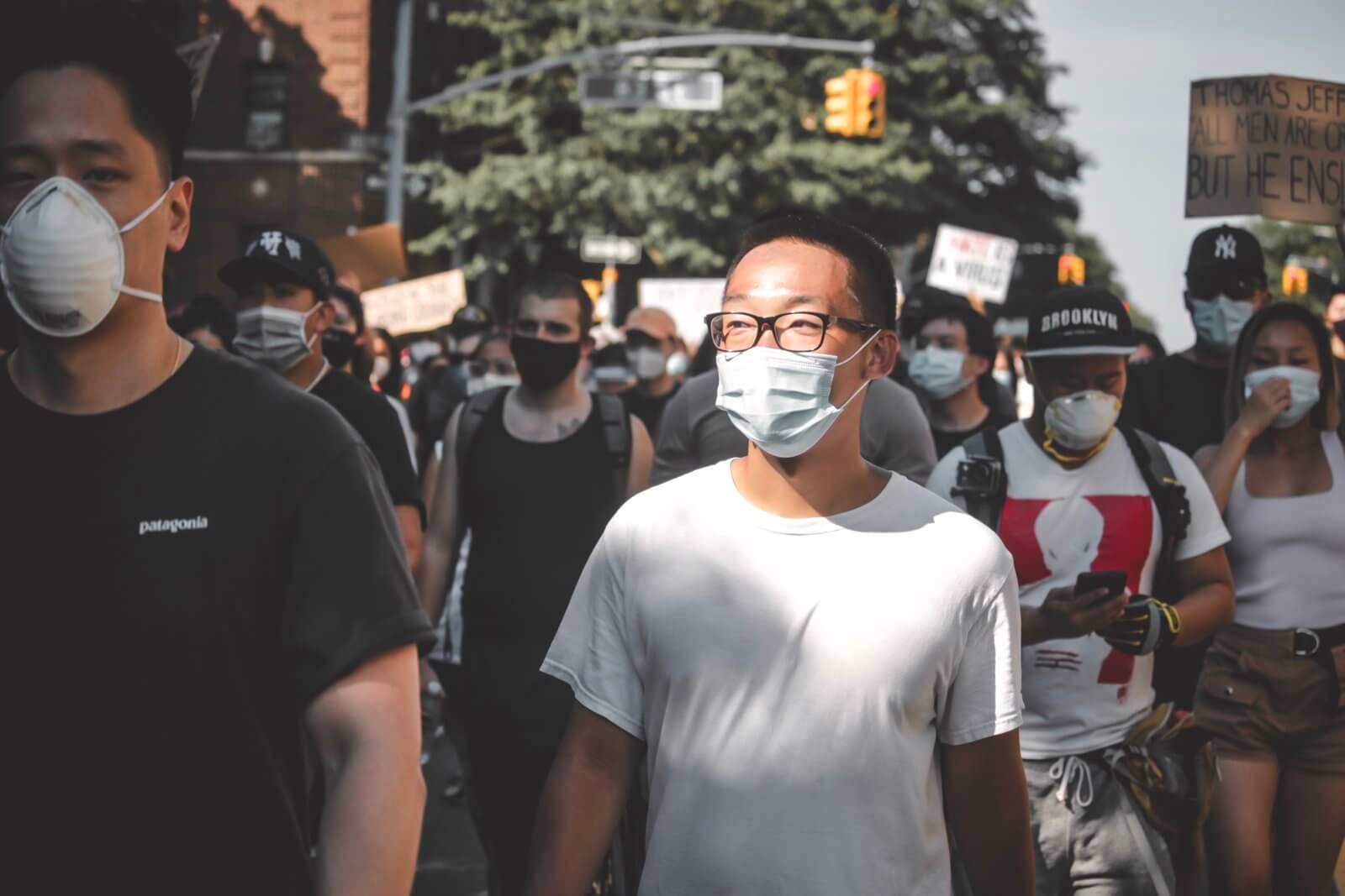 Asian-Americans lead march after 89-year-old woman set on fire