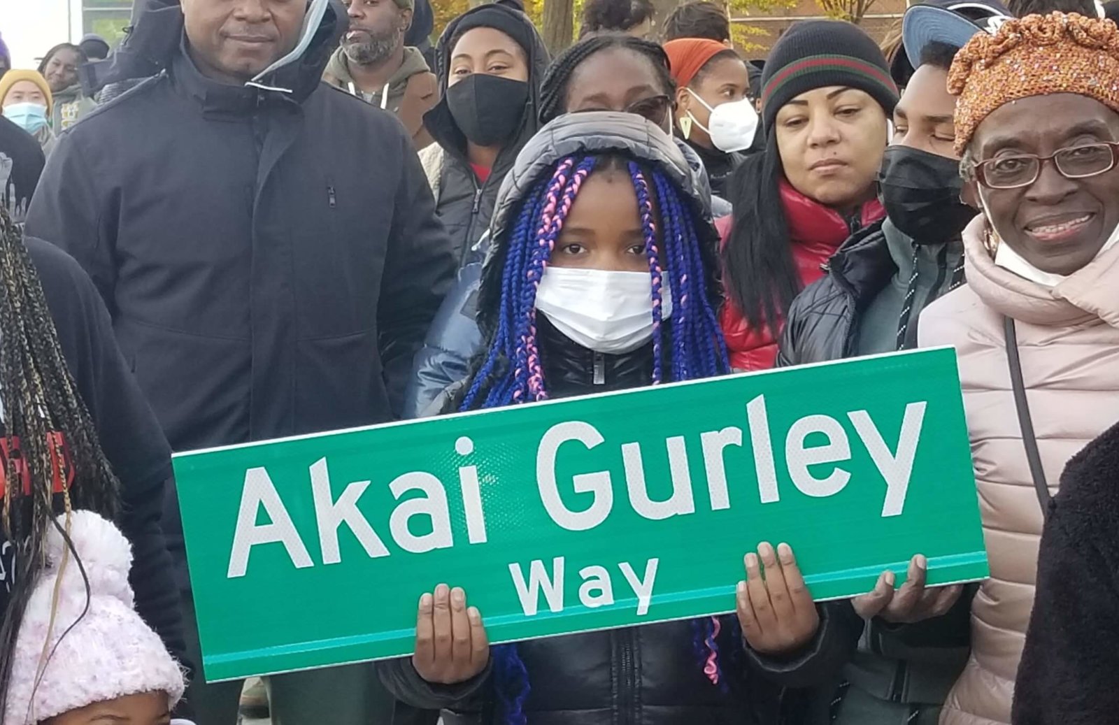 Akai Gurley honored with street co-naming outside building where he was ...