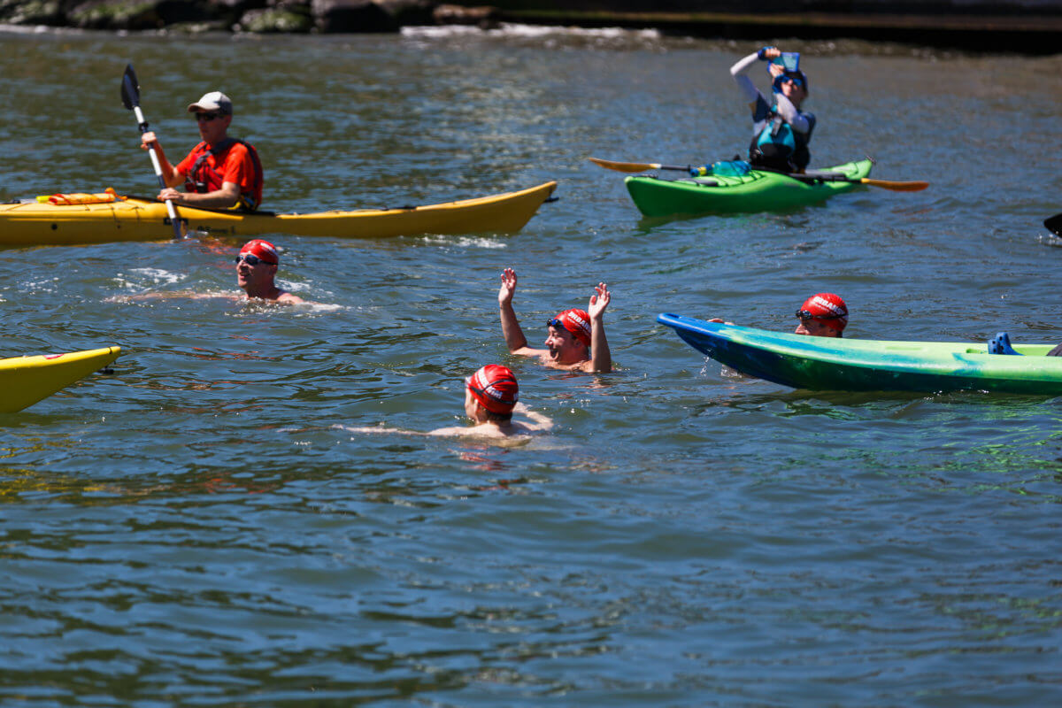‘I feel like a kid’: Open water swimmers traverse the Brooklyn ...